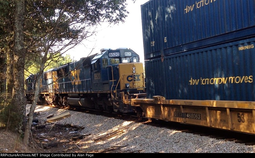 CSX SD50-2's 8576 and 8520 round the curve